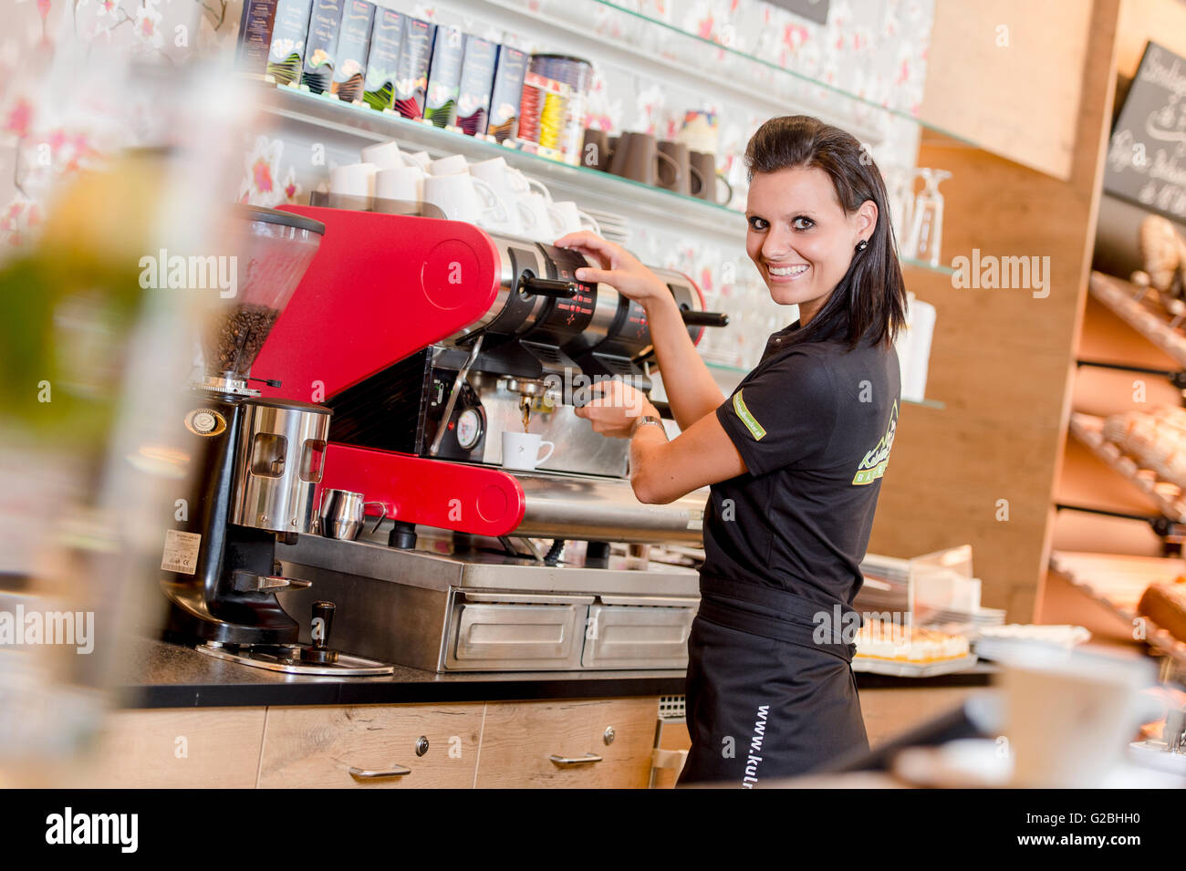 Waitress making coffee, Austria Stock Photo - Alamy