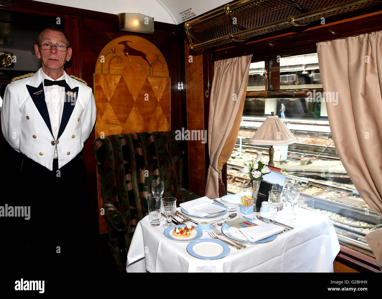 A table set up on board the Belmond British Pullman Steam train at ...