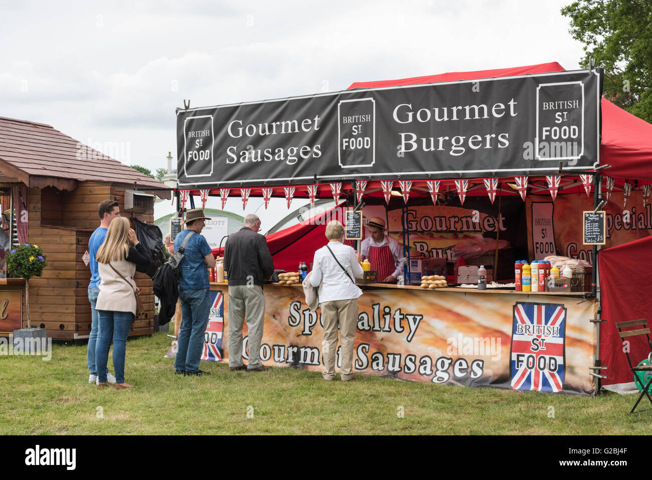 Gourmet Burger and sausage food stand at a country show Stock Photo - Alamy