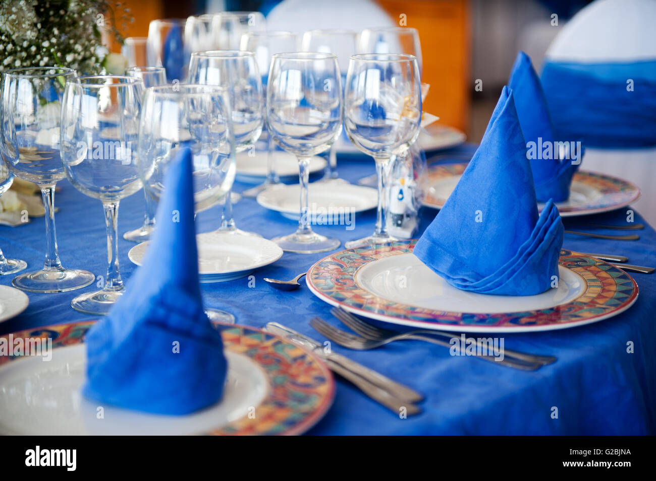beautiful table with blue napkins Stock Photo - Alamy