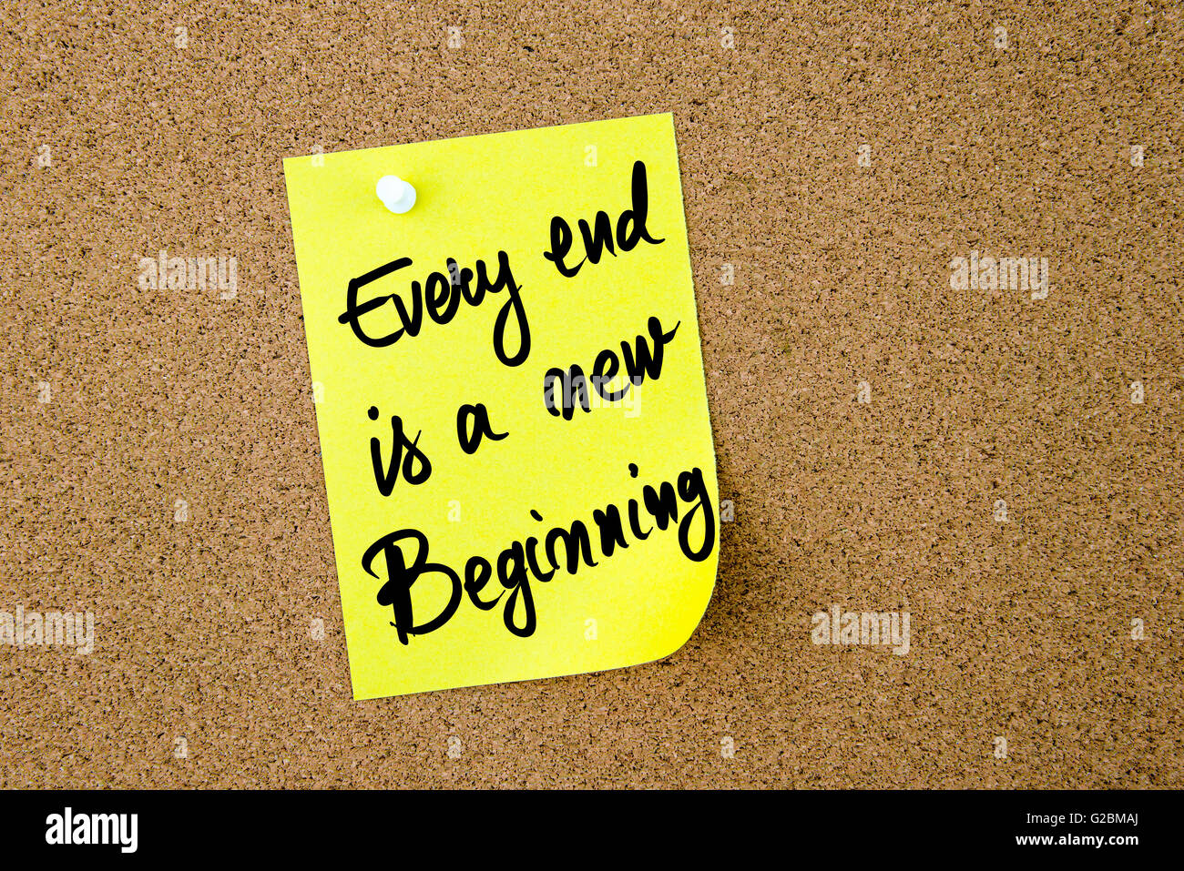Every End Is A New Beginning written on yellow paper note pinned on ...