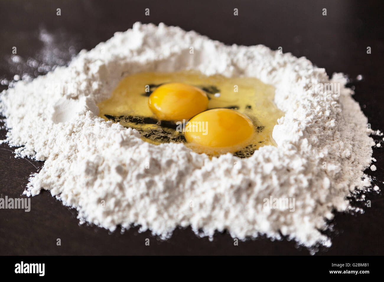 Making homemade pasta with flour and eggs Stock Photo - Alamy