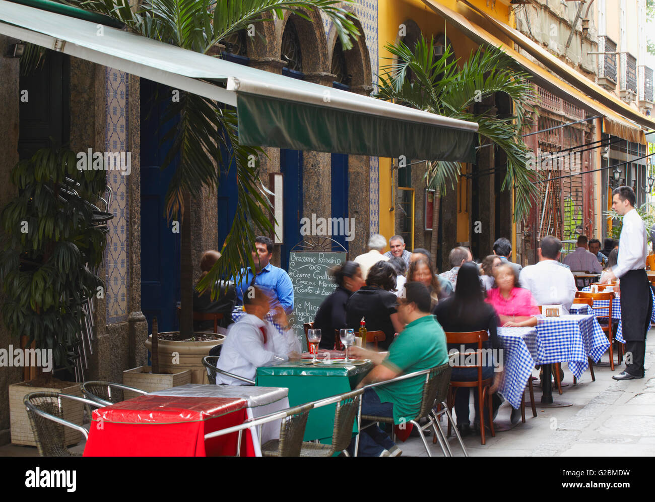 People eating at restaurants along Travessa do Comercio, Centro, Rio de ...