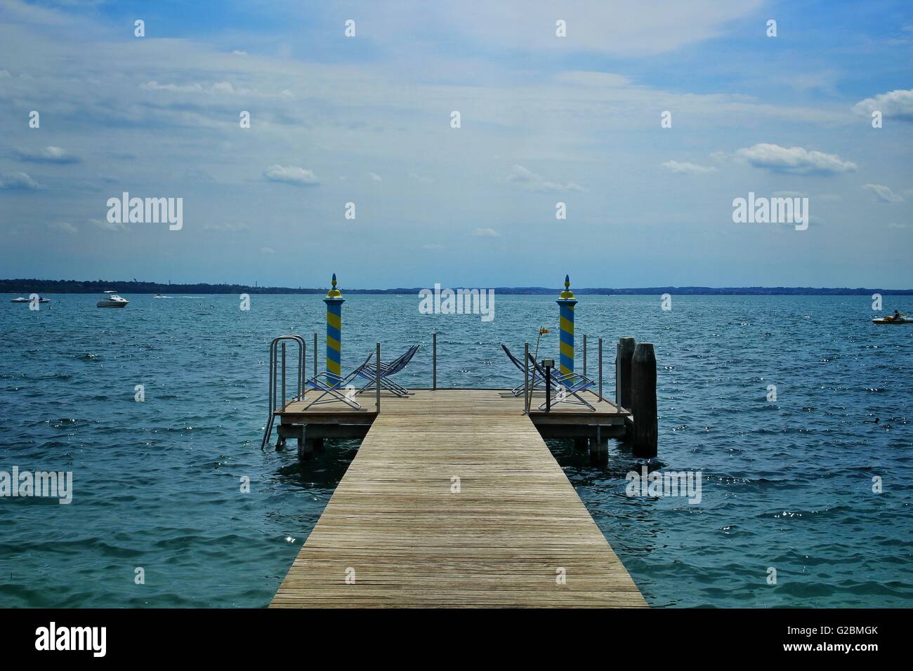 Pontoon (boardwalk) heading out into lake Garda Stock Photo - Alamy