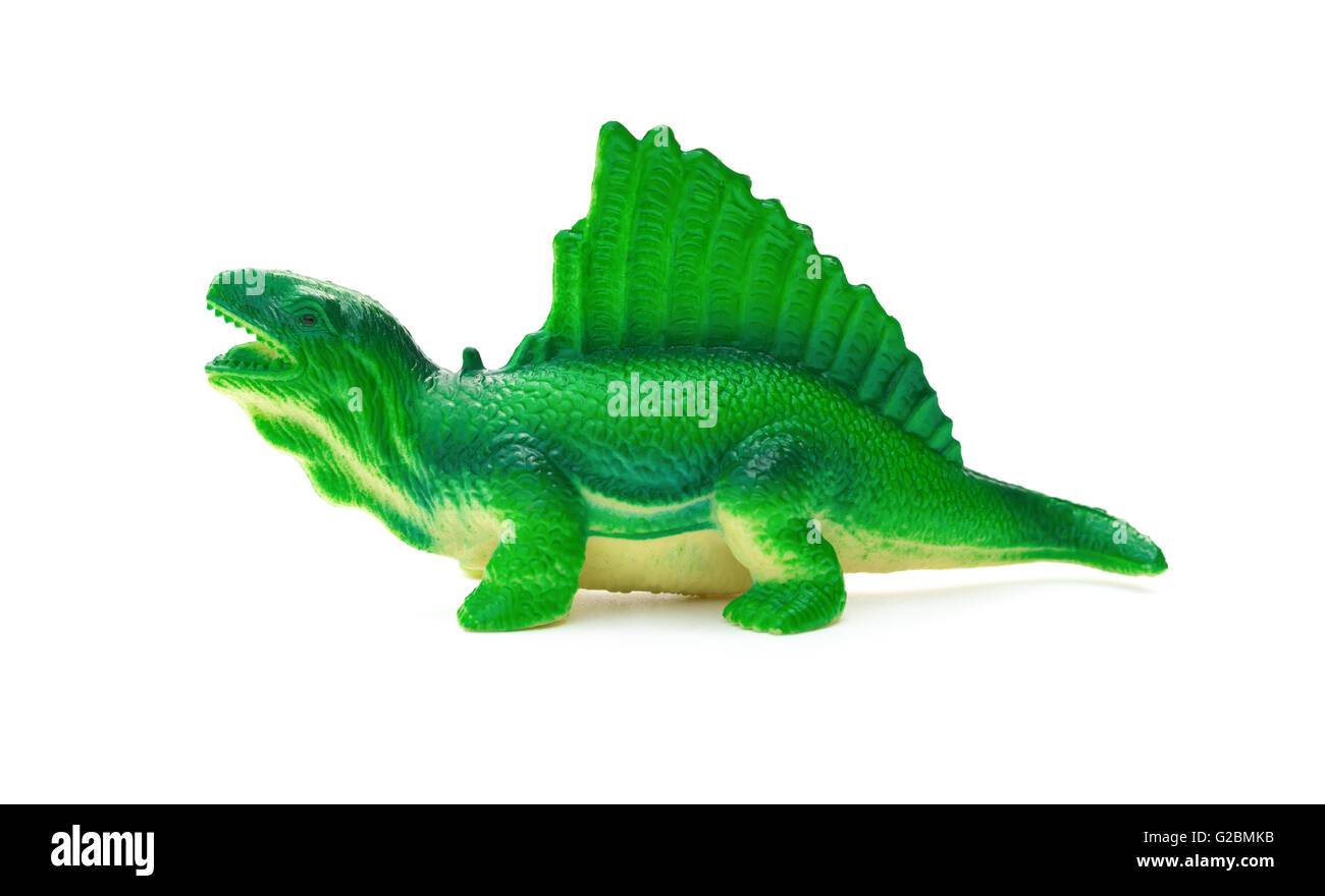 side view green dimetrodon toy on a white background Stock Photo - Alamy