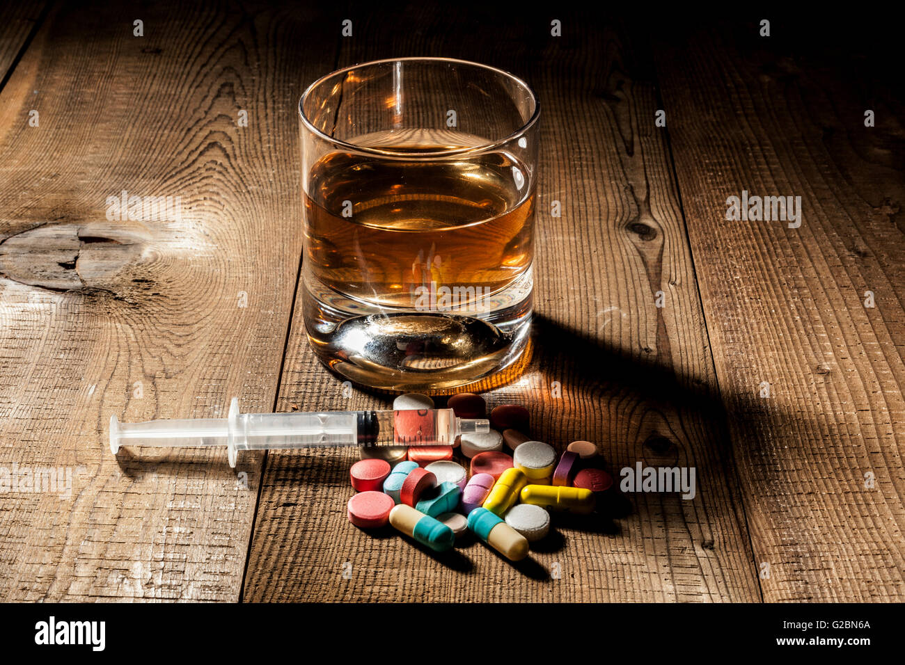 Alcohol with drugs on table hi-res stock photography and images - Alamy