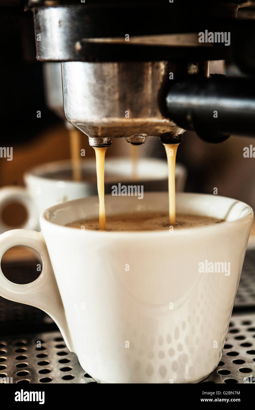 Big coffee machine doing delicious coffee in the morning Stock Photo ...