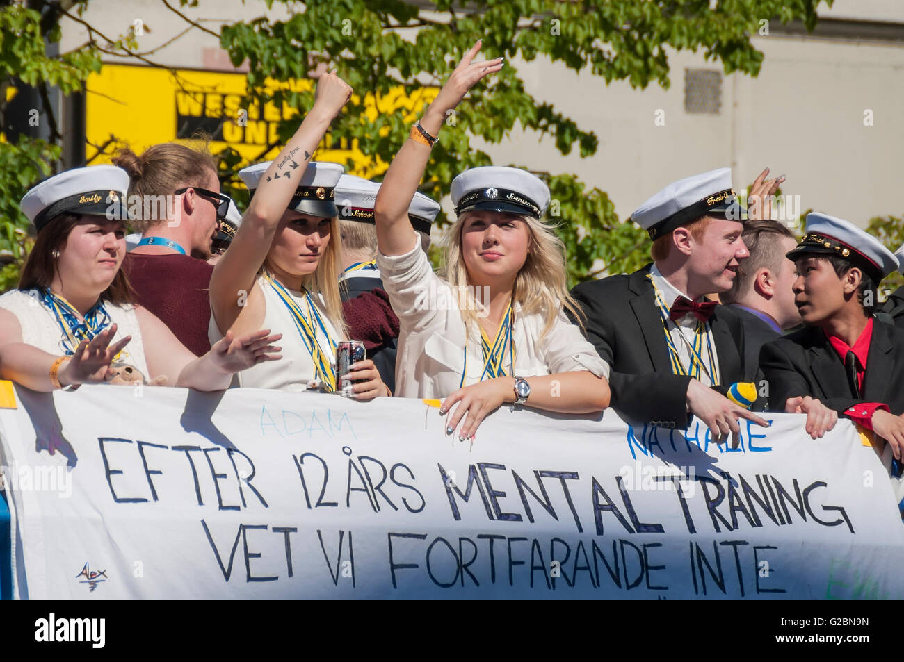 Graduates from different schools take part in a celebration parade ...