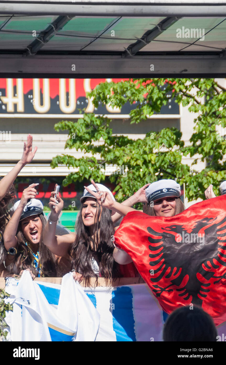 Graduates from different schools take part in a celebration parade ...