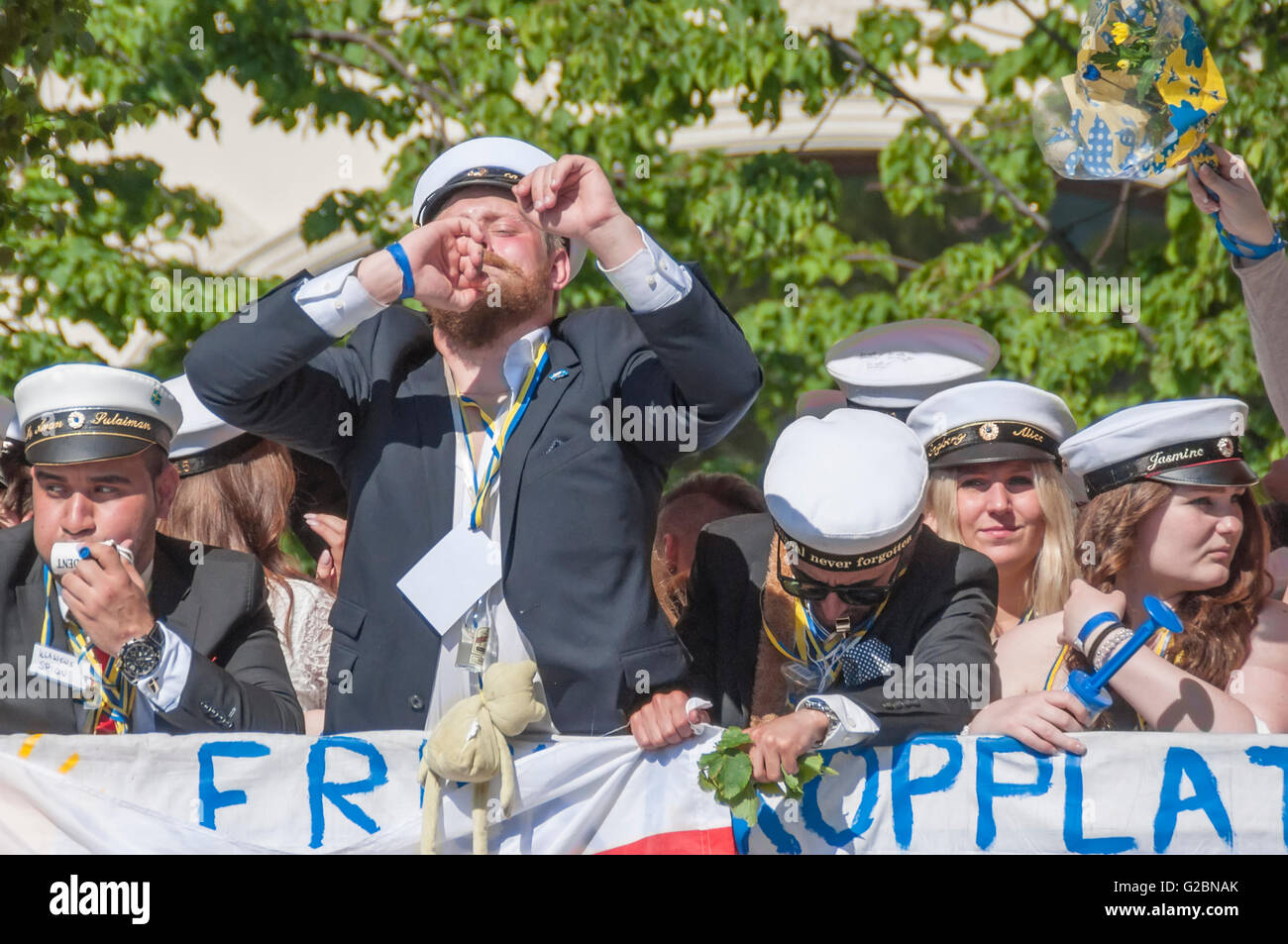 Graduates from different schools take part in a celebration parade ...