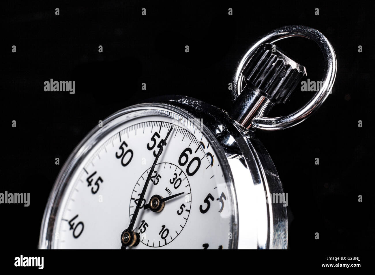 Part of a chronometer isolated on black background Stock Photo - Alamy