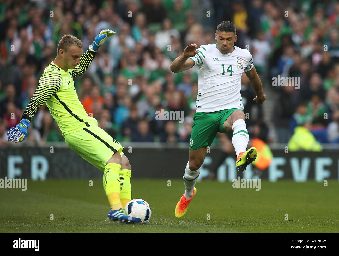 Netherlands goalkeeper Jasper Cilessen (left) clears from Republic of ...