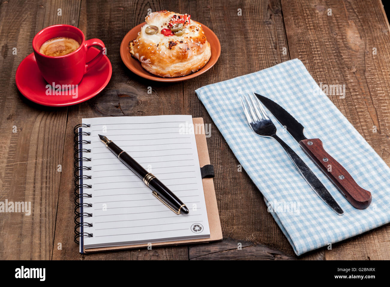 Note and pen and some delicious food Stock Photo - Alamy