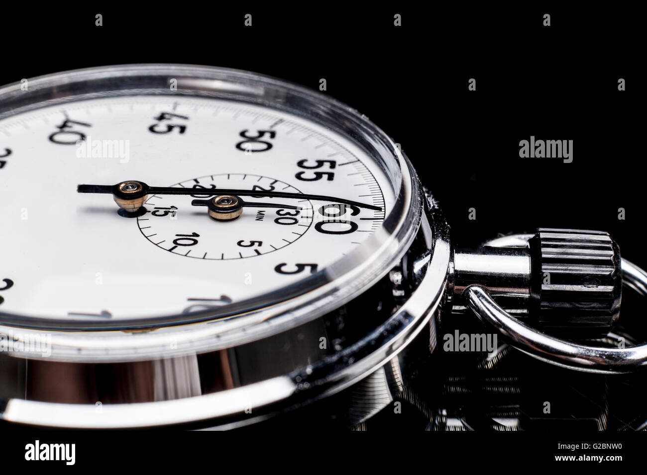 Chronometer isolated on black background with reflexion Stock Photo - Alamy