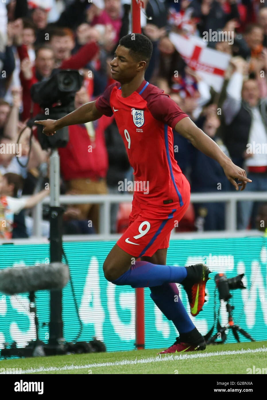 England's Marcus Rashford celebrates scoring his sides opening goal ...