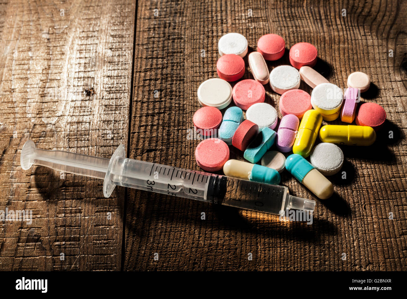 Alcohol with drugs on table hi-res stock photography and images - Alamy