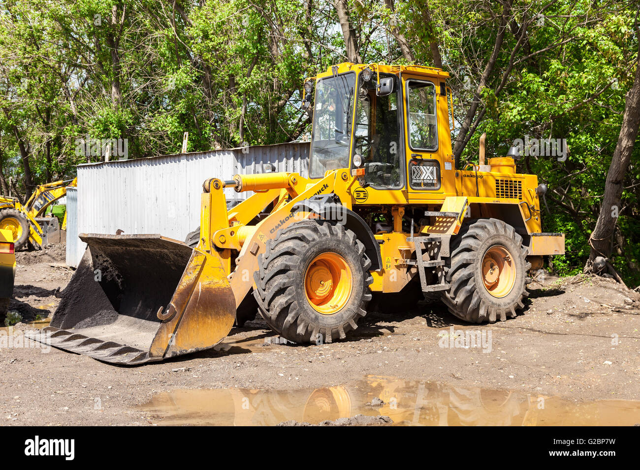 Heavy loader for construction the road parked near the under ...