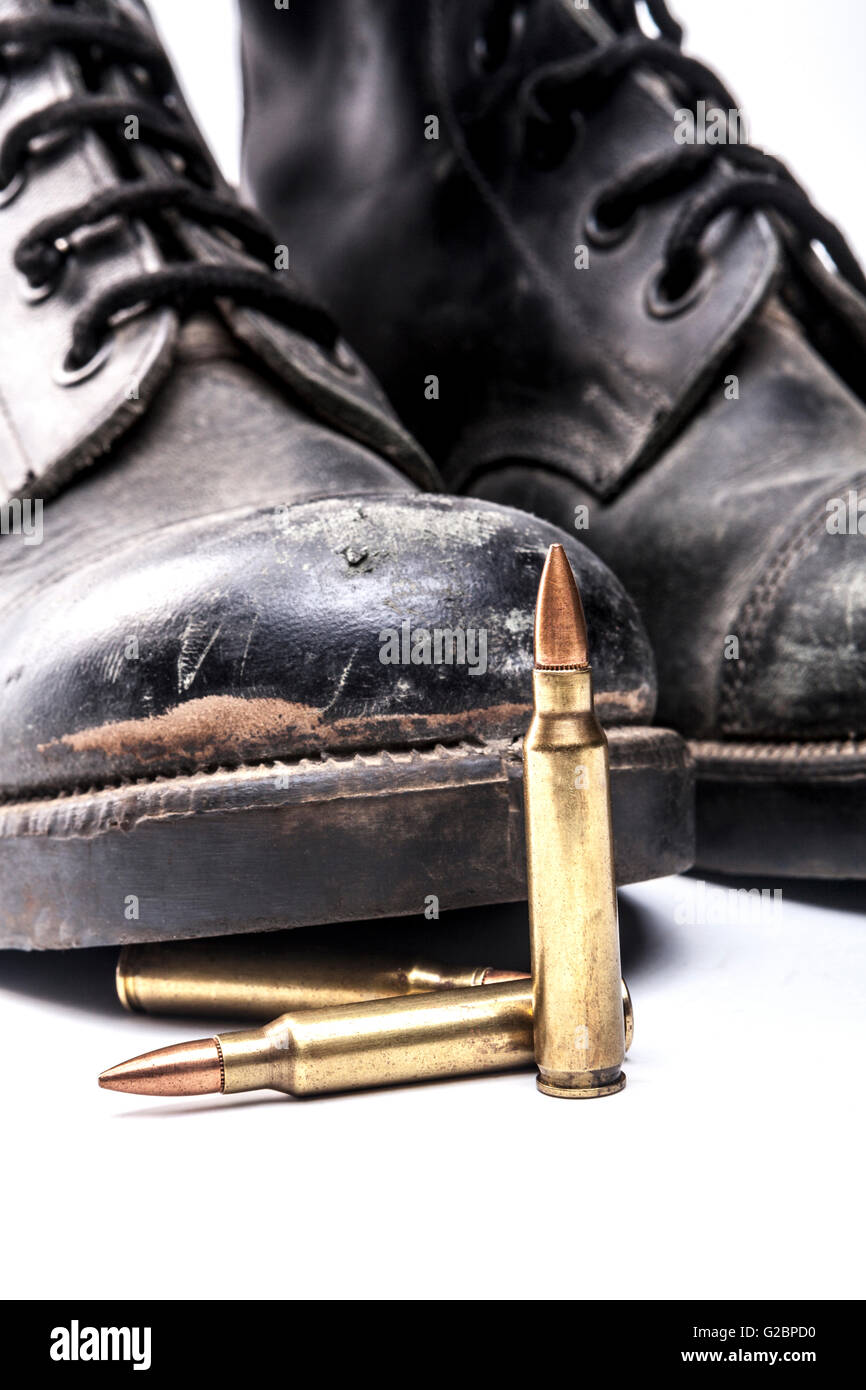 Bullets and army boots isolated on white background with shadow Stock ...
