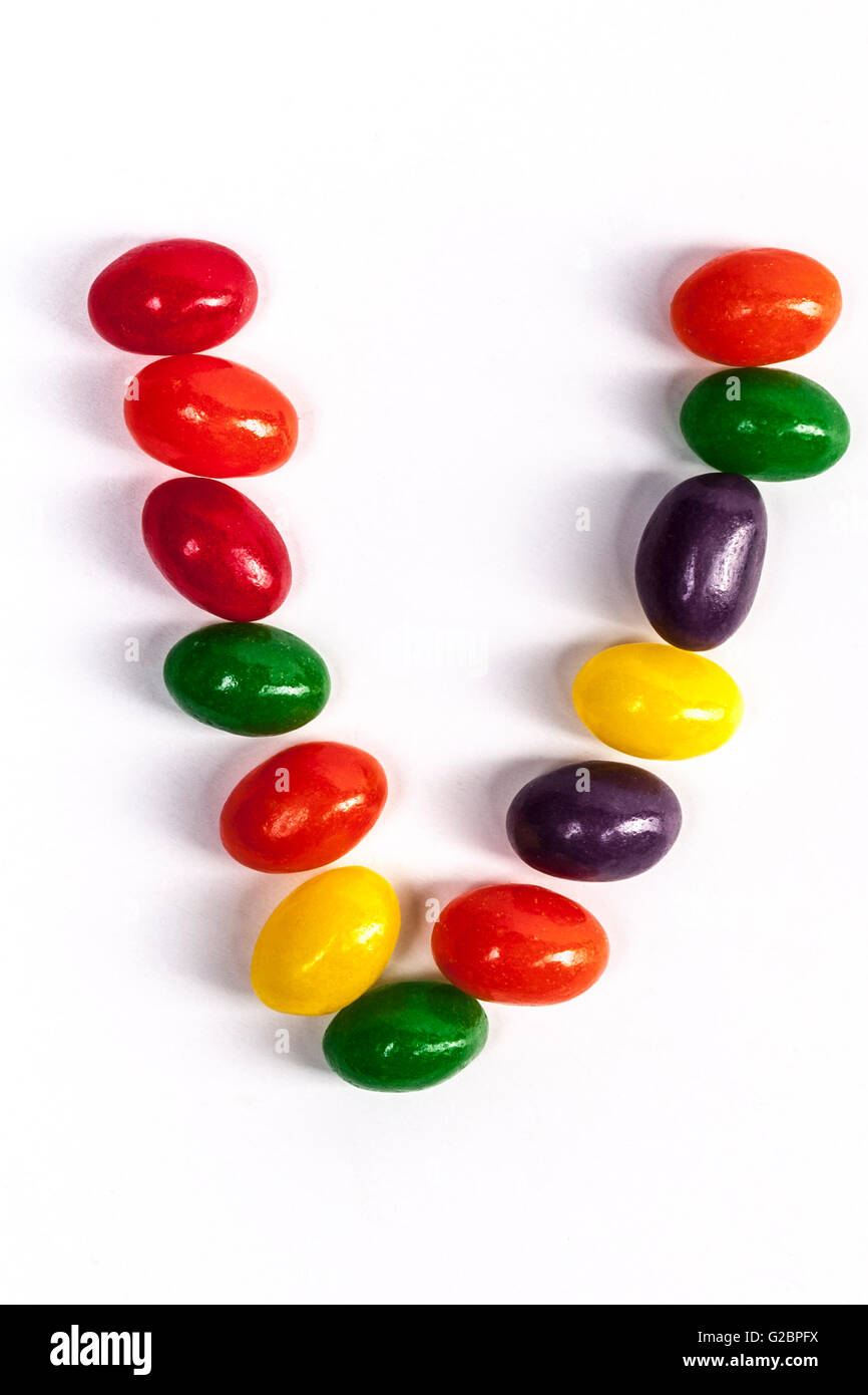 Letter V isolated on white background with shadow Stock Photo - Alamy