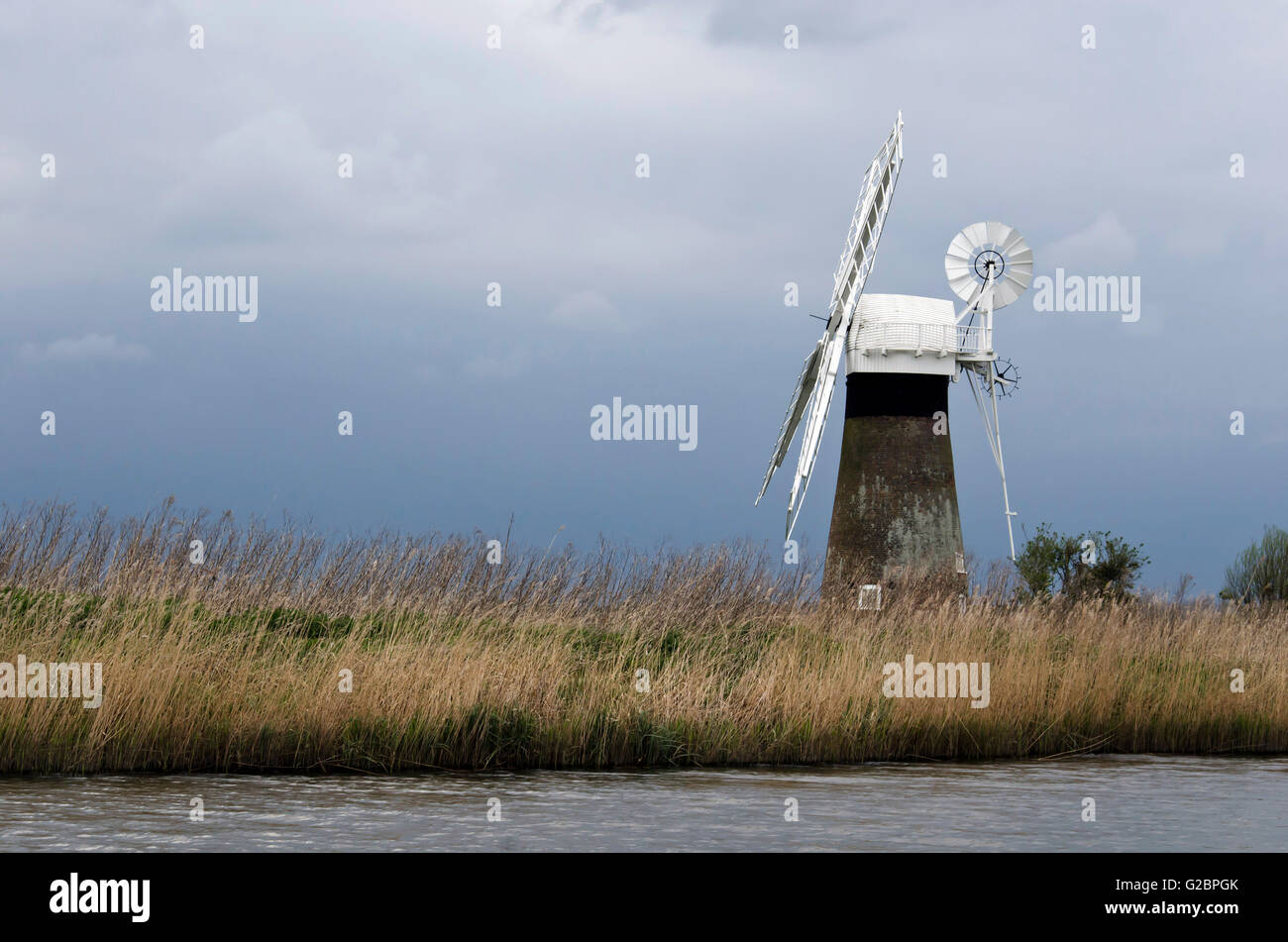 Wind drainage mill near Potter Heigham on the Norfolk Broads in the ...