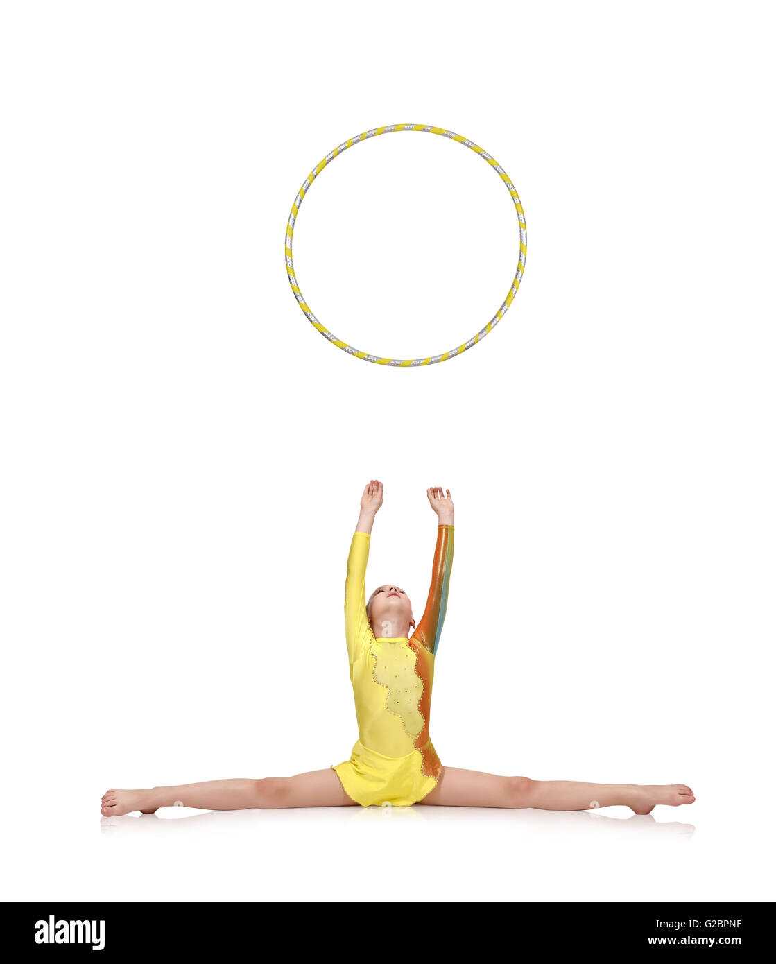 young girl-gymnastthrows up hula hoop isolated on white Stock Photo - Alamy