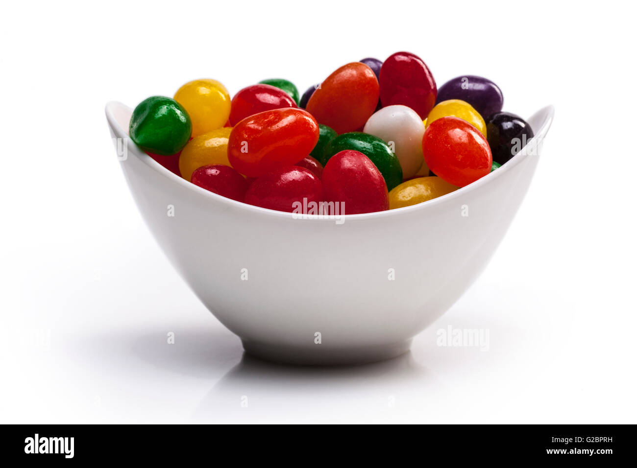 Candies in a bowl isolated on white background with shadow Stock Photo ...
