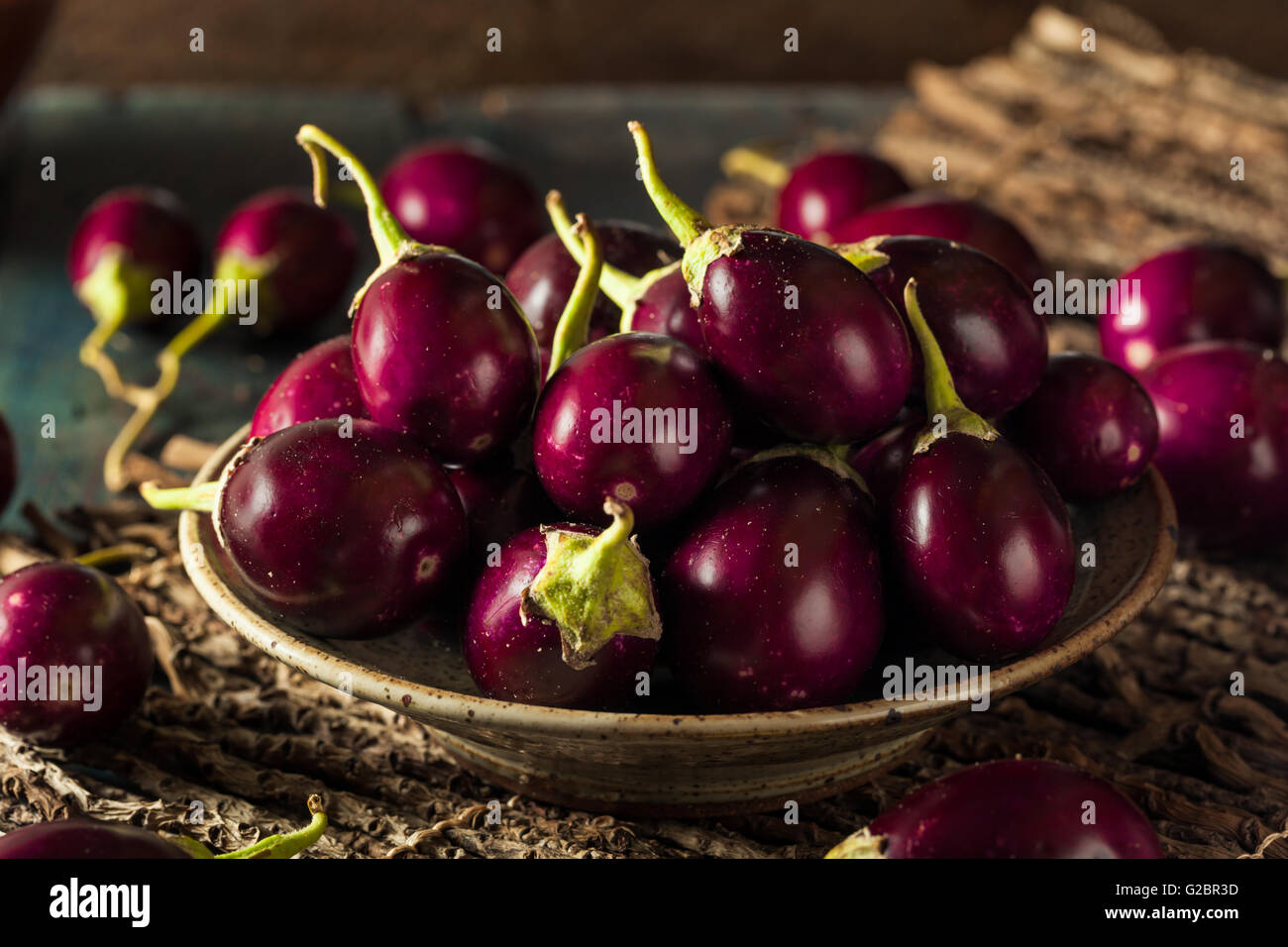 Organic Raw Baby Indian Eggplants in a Bowl Stock Photo - Alamy