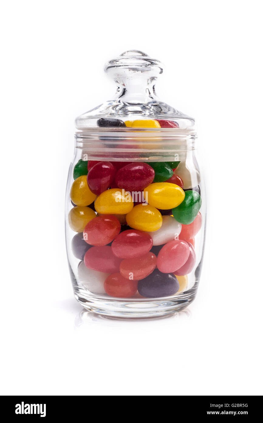 Container full with colorful bon bons isolated on white background and ...