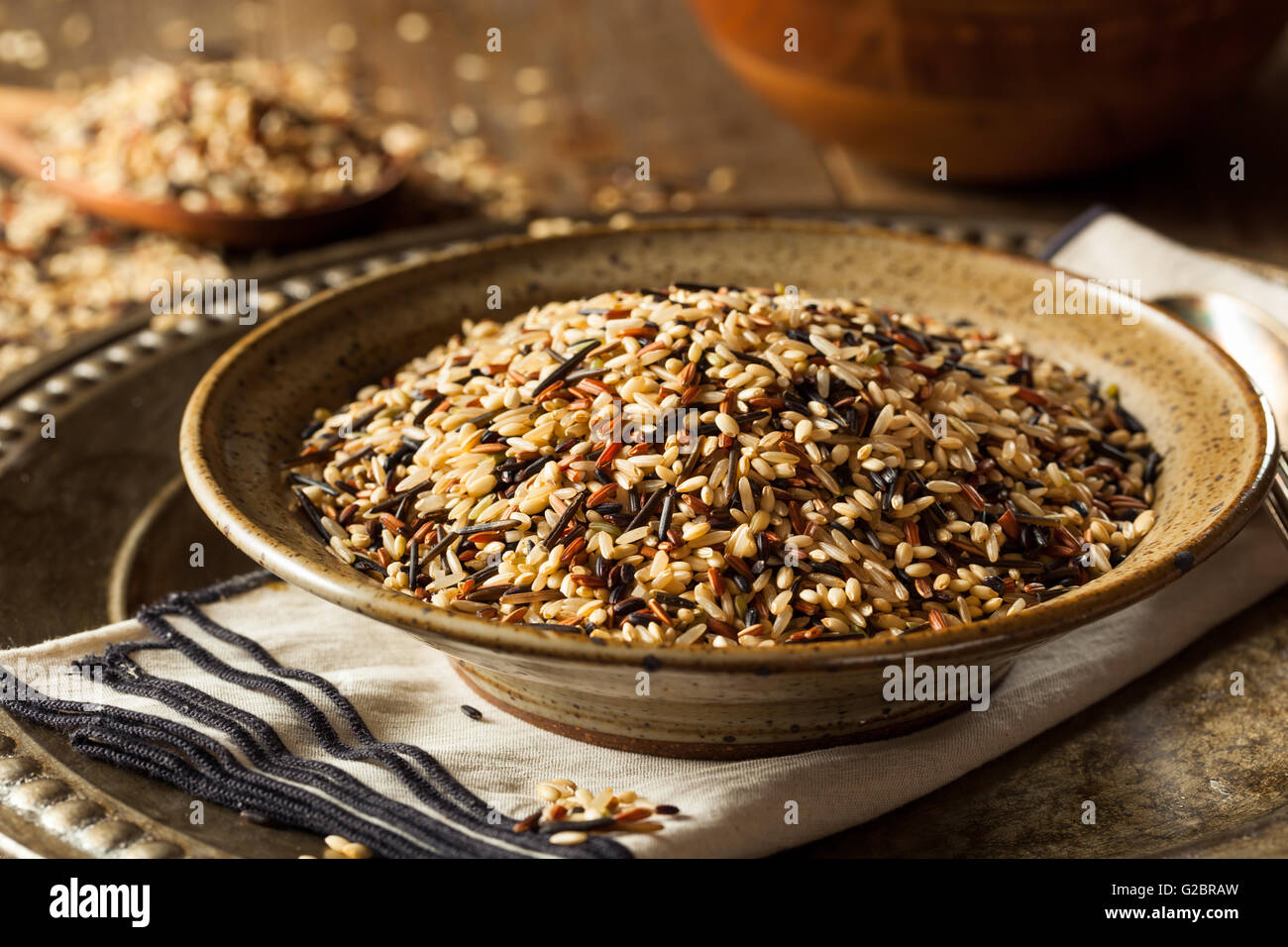 Raw Dry Organic Wild Rice in a Bowl Stock Photo - Alamy