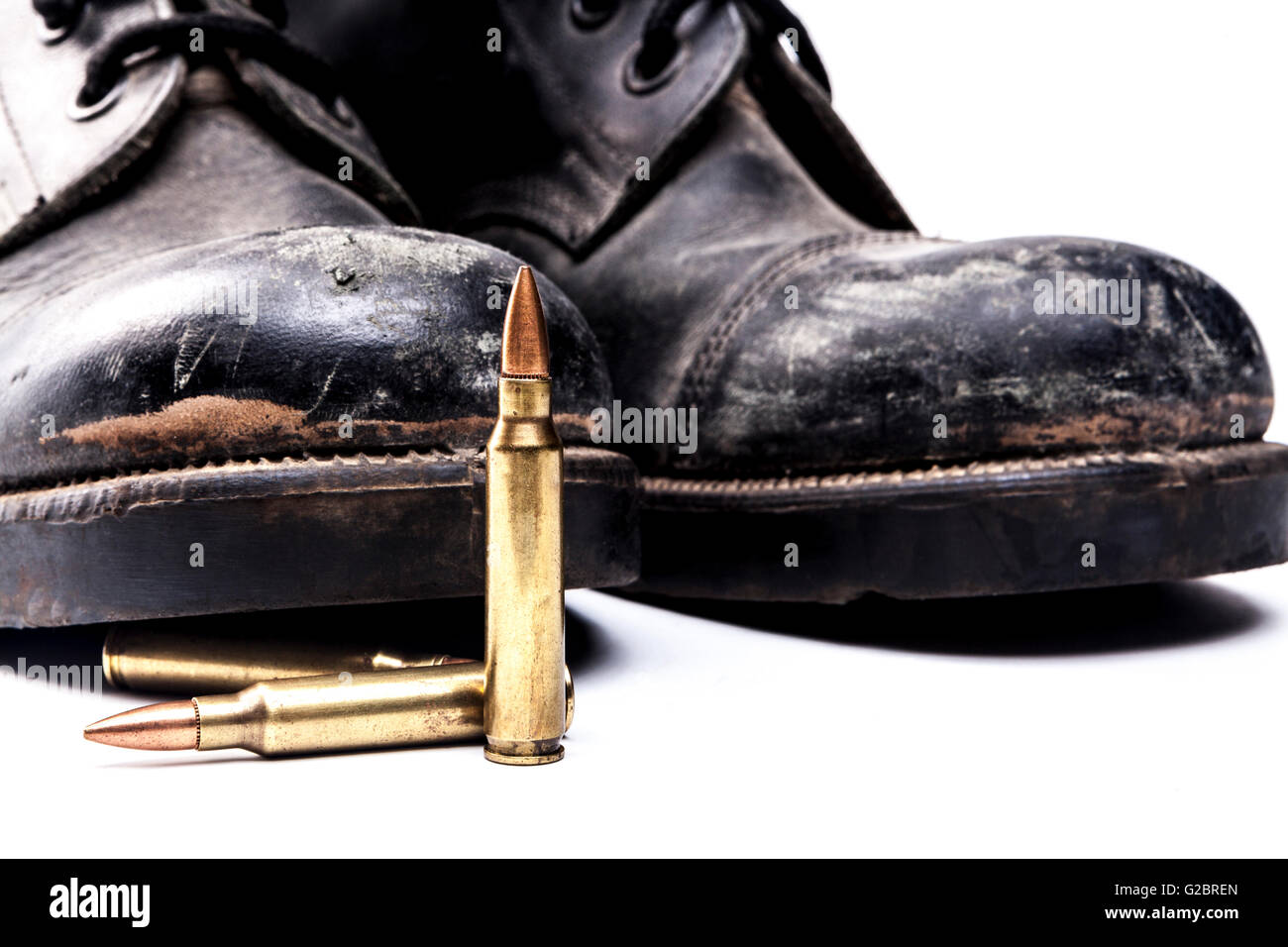 Army boots and bullets isolated on white background with shadow Stock ...
