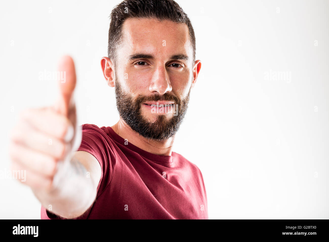 thumbs up man with beard means success or approval Stock Photo - Alamy