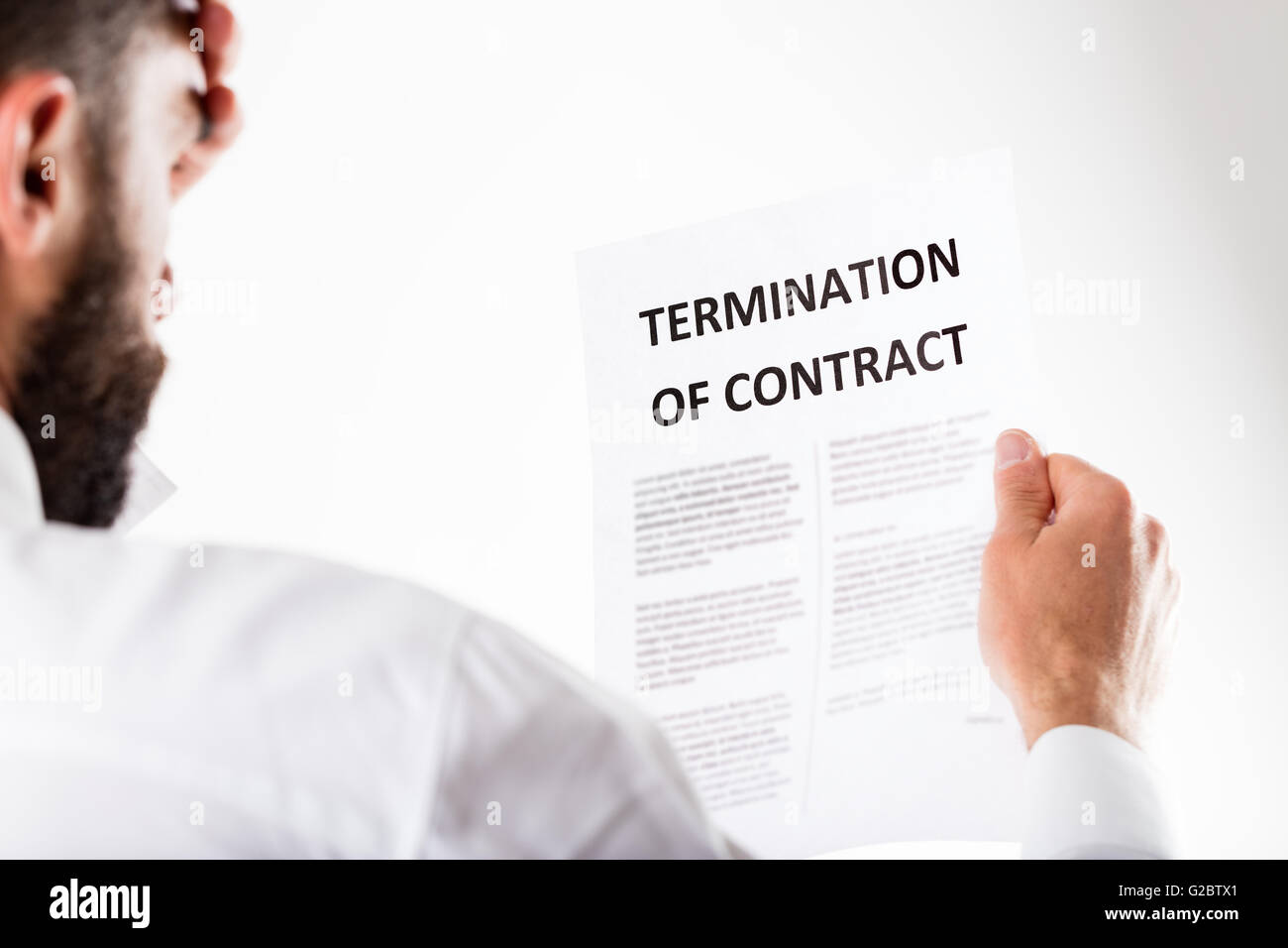 man being fired with contract termination is torn Stock Photo - Alamy