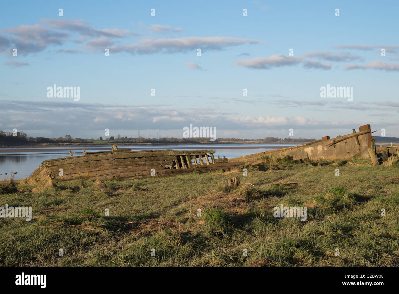 Hulks along the banks of the River Severn at Purton in southern England ...