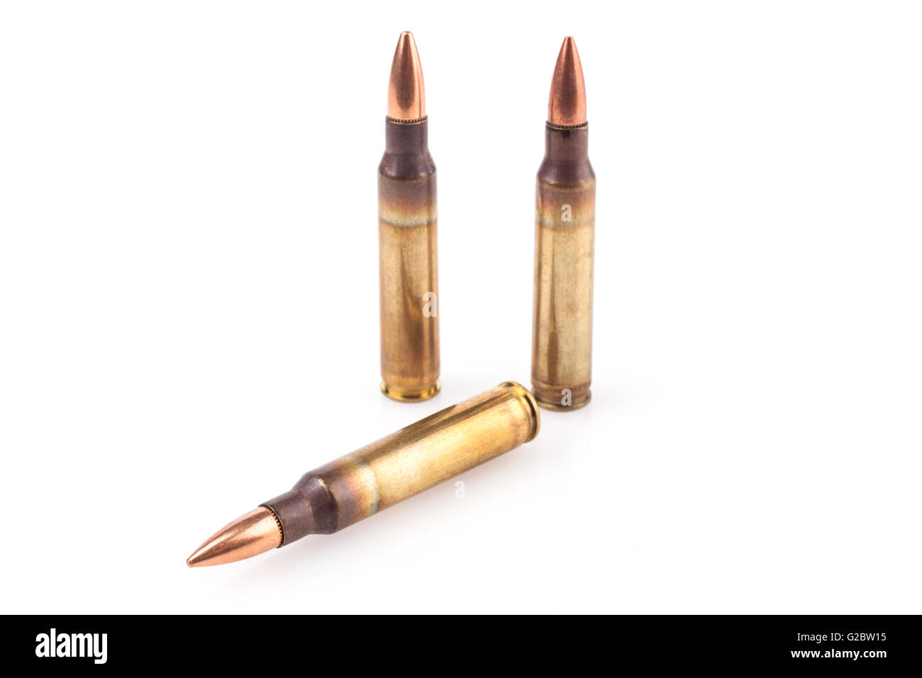 Three Isolated Bullets On White Background With Reflection Stock Photo ...