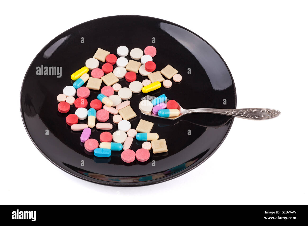 Medicine red black in capsule Cut Out Stock Images & Pictures - Alamy