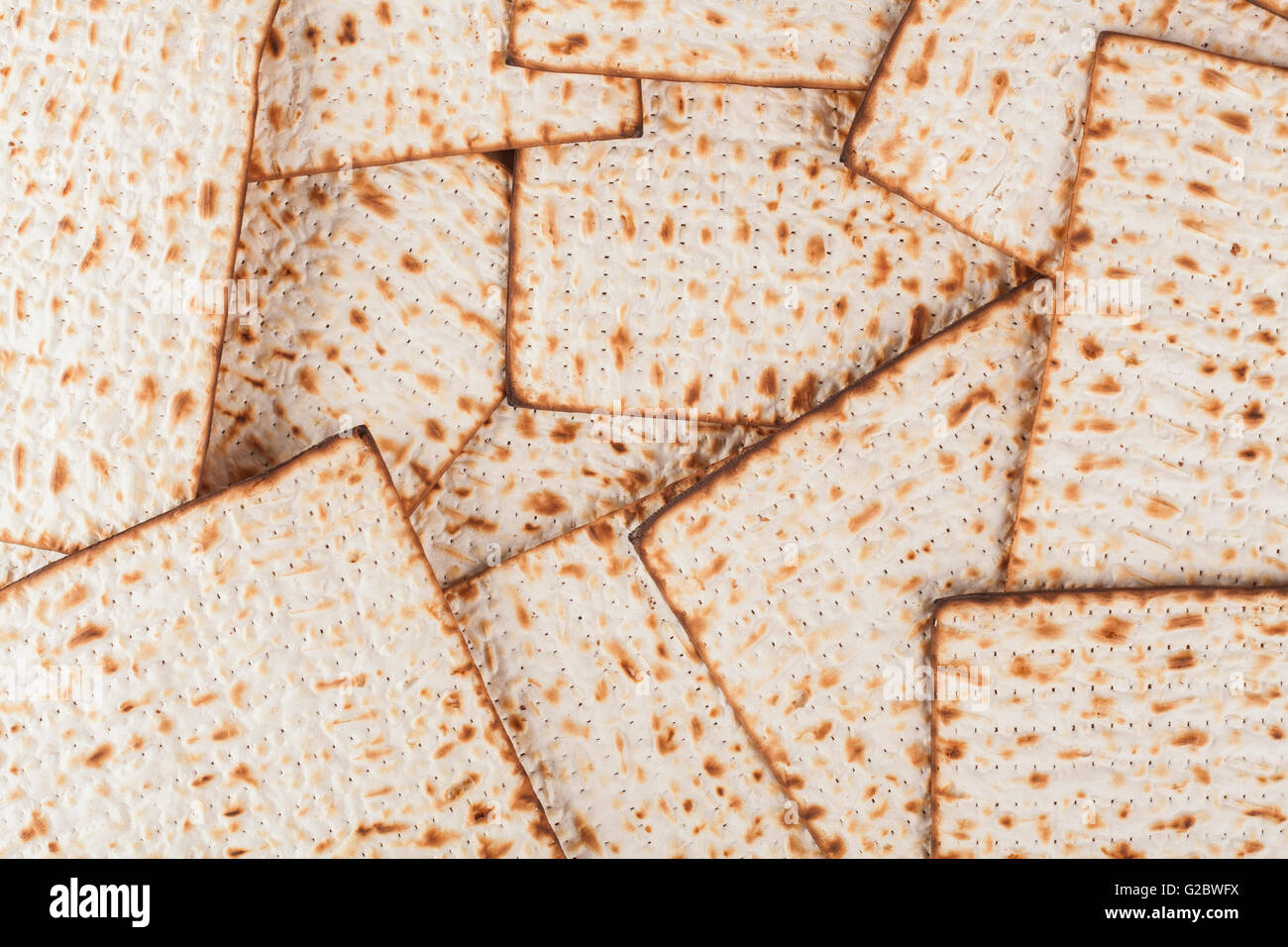 Matzot for pesach pile isolated on white background Stock Photo - Alamy
