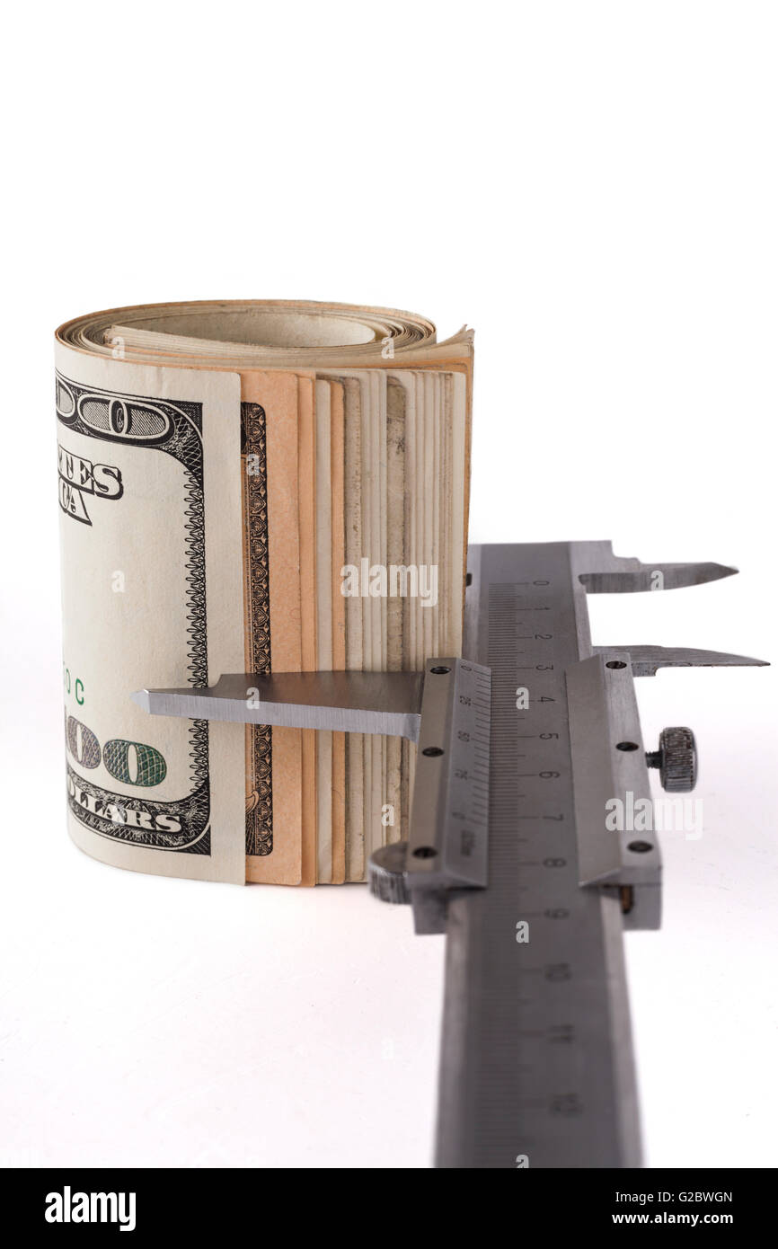 Measuring dollar banknotes with calliper isolated on white background ...