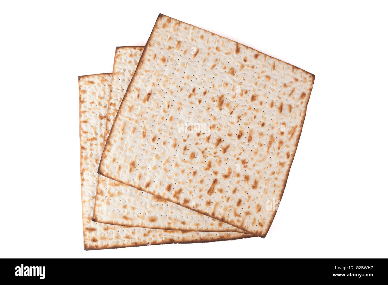 Matzot for pesach pile isolated on white background Stock Photo - Alamy