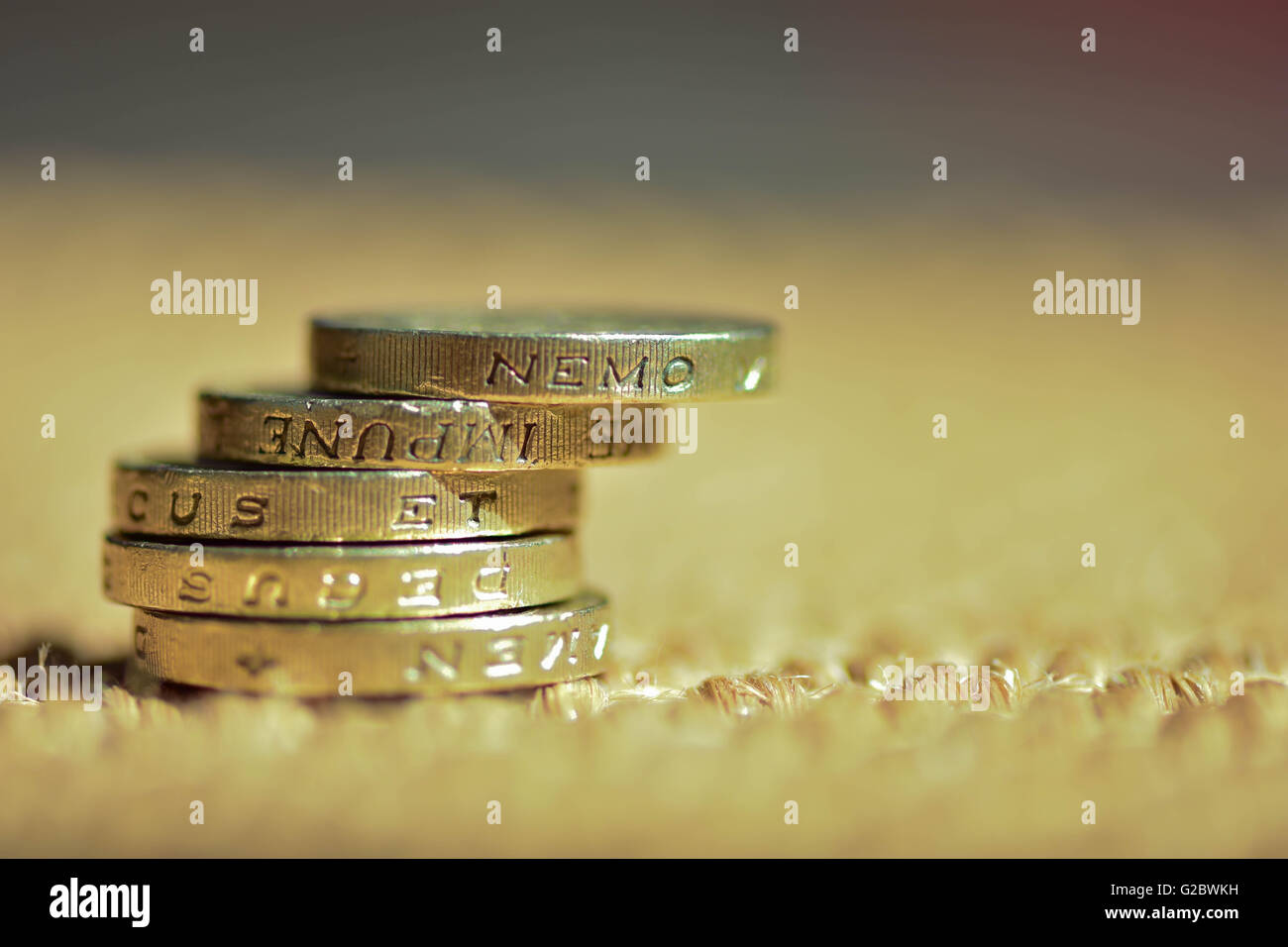 Uk pound coins in a stack hi-res stock photography and images - Alamy