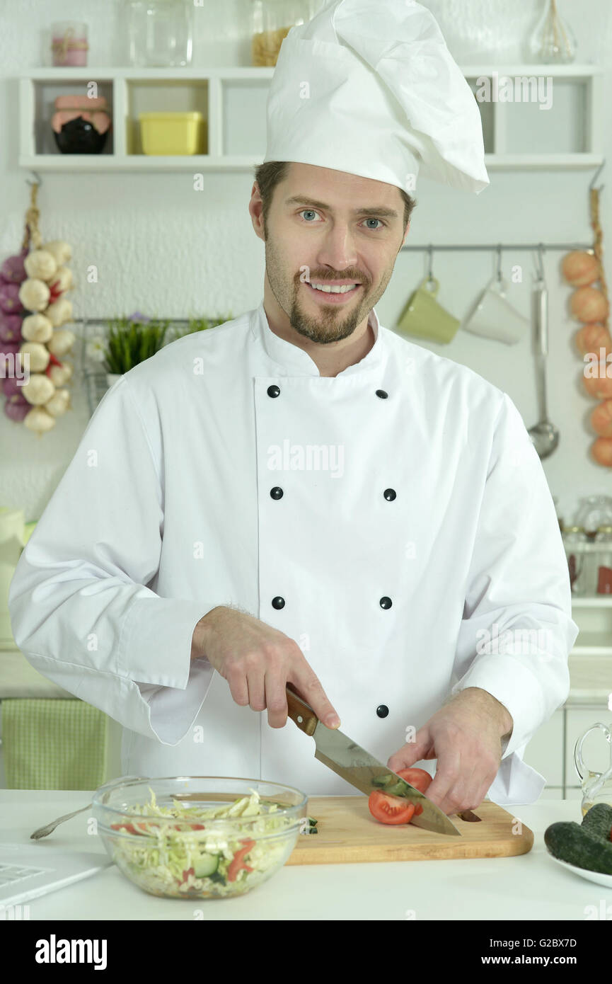Man cooking in kitchen Stock Photo - Alamy