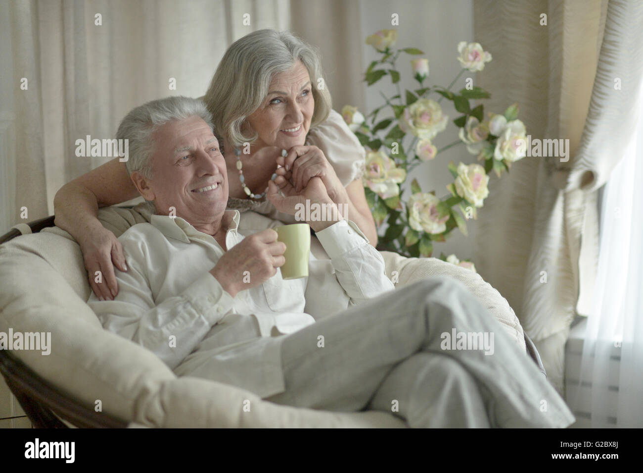 Room seniors sitting tea tender together two wife woman hi-res stock ...