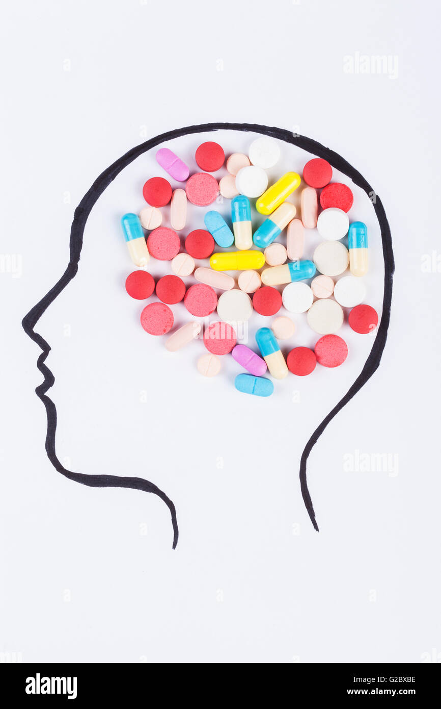 Human head hand drawing with colored pills in the brain Stock Photo - Alamy