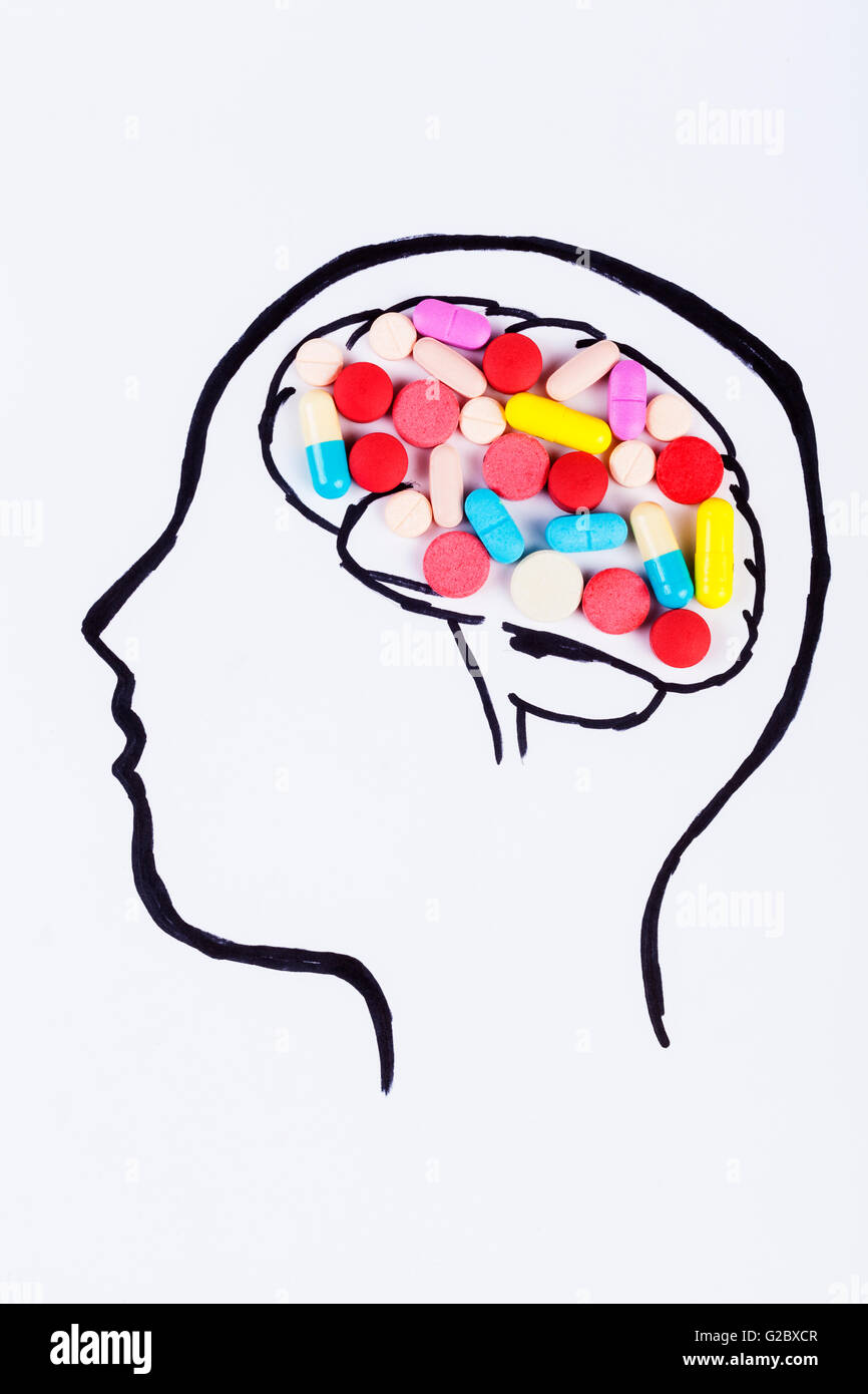 Human head hand drawing with colored pills in the brain Stock Photo - Alamy