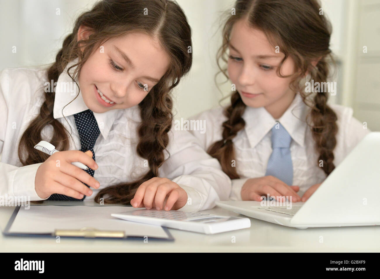 little girls making homework Stock Photo - Alamy