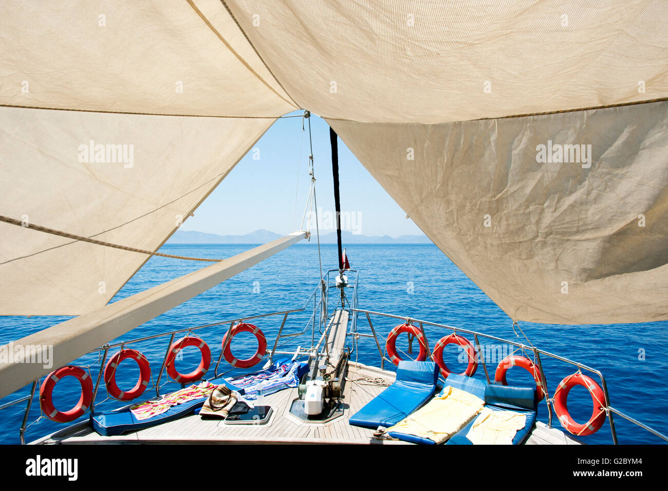 Set sail and life rings on a cruise ship in the Turkish Aegean Sea ...