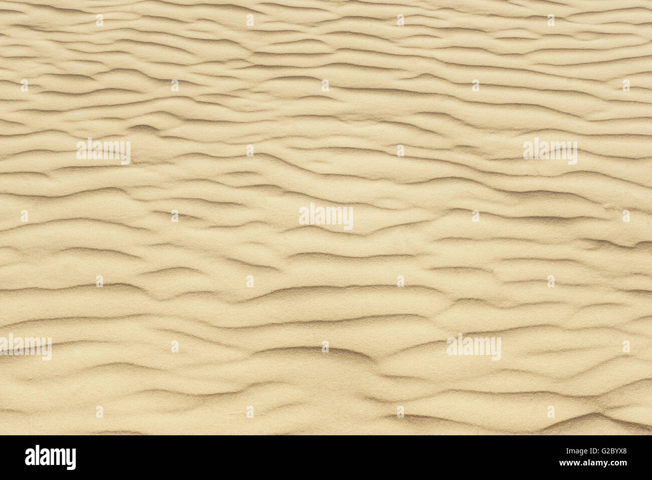 A texture of crystal clear sand with waves Stock Photo - Alamy