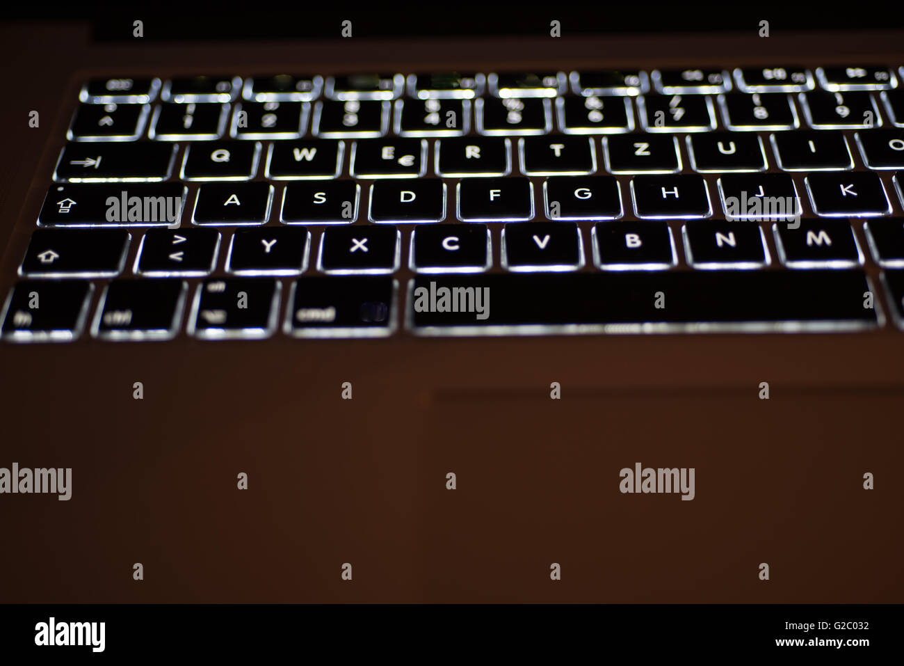 illuminated computer keyboard - work at night concept Stock Photo - Alamy