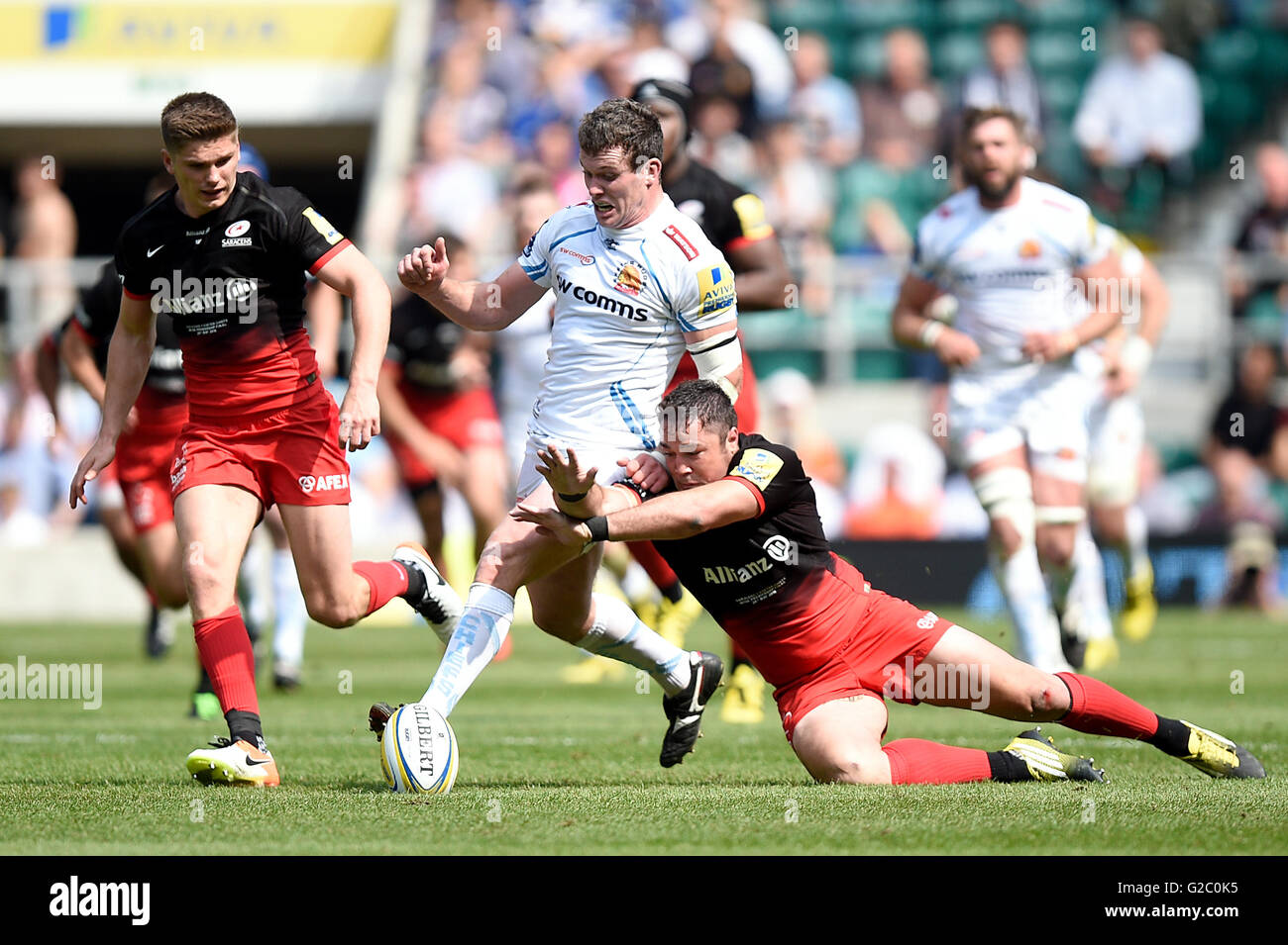 Exeter Rugby's Ian Whitten (centre) and Saracens' Brad Barritt (right ...