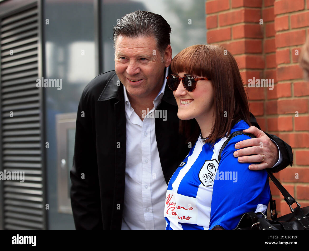 A Sheffield Wednesday fan poses for a picture with Chris Waddle (left ...