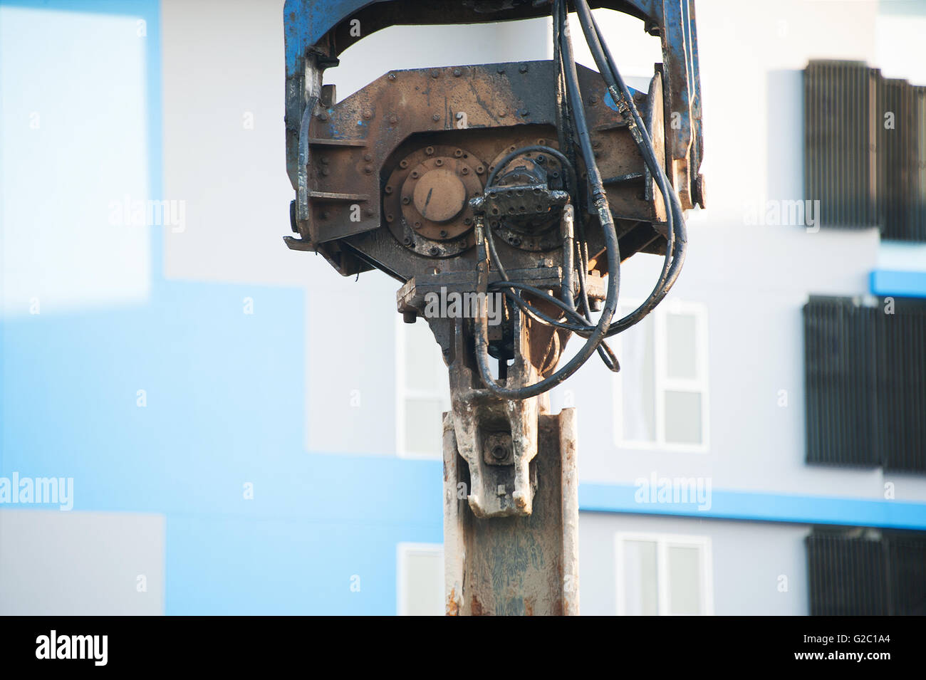 An Machine Drilling in Construction place Stock Photo - Alamy